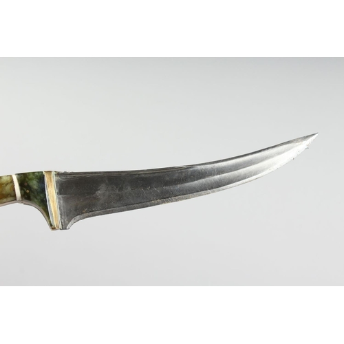 AN INDIAN JADE HANDLED DAGGER, with curving blade and wooden sheath ...