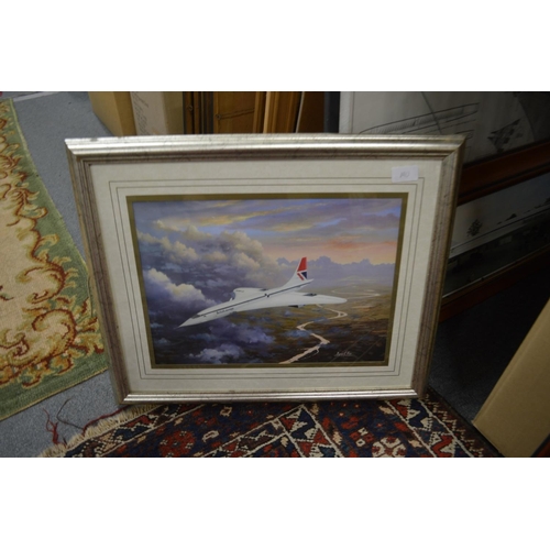 Four prints/photographs relating to concorde.