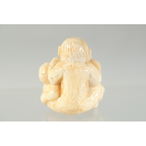 A CARVED BONE MONKEY NETSUKE. 4cm.