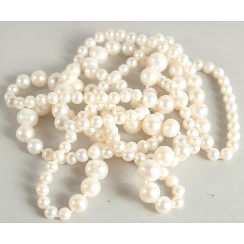 A LONG STRING OF PEARLS. 44ins long.