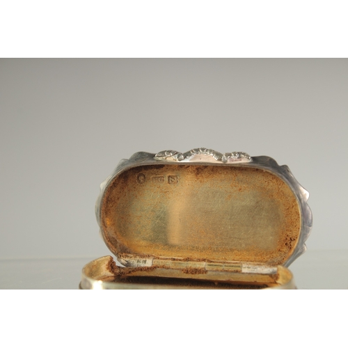 A VICTORIAN ENGRAVED SILVER SNUFF BOX. Birmingham 1874. Maker: E. C.