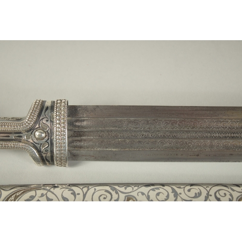 A VERY GOOD RUSSIAN SILVER HANDLE AND SHEATH DAGGER, dated 1894, with ...
