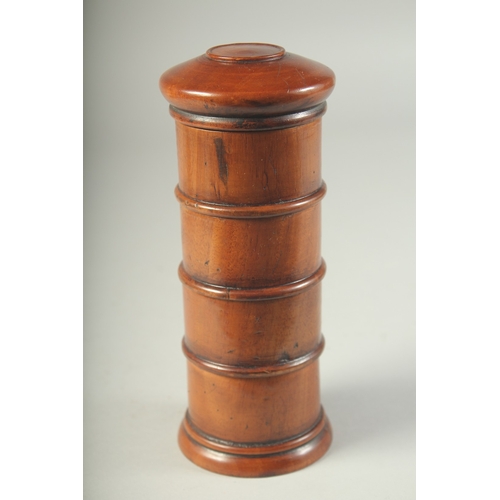A FOUR DIVISION SPICE TOWER. Cloves, Ginger, Mace, Nutmeg. 7.5ins high.