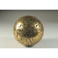AN 18TH CENTURY BRASS PIERCED BALL POMANDER. 5.5ins diameter.
