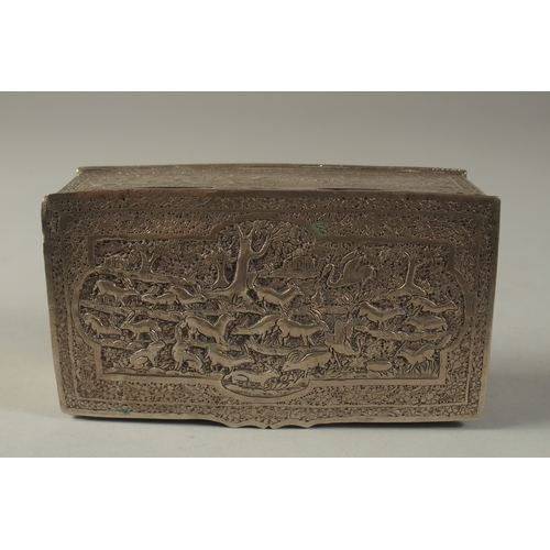 AN EMBOSSED AND CHASED SILVER BOX, with hinged lid, finely decorated ...