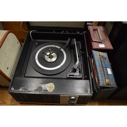 An old projector, record player, records, gramophone etc.