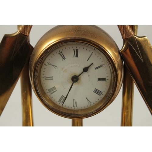 A NOVELTY CRICKET CLOCK formed as a ball, two bats, a stump and gloves ...