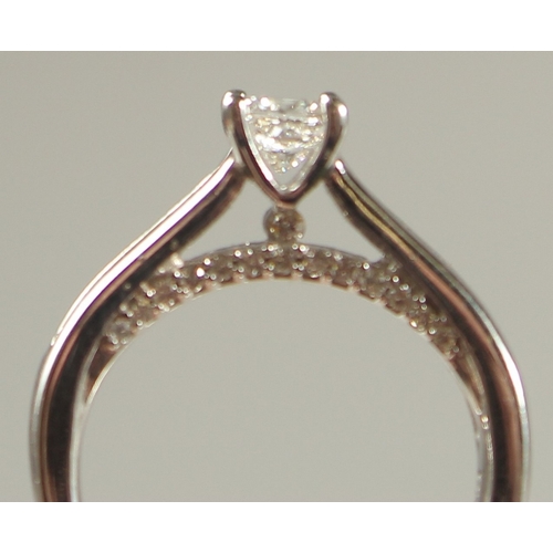 A 14ct WHITE GOLD PRINCESS CUT DIAMOND SOLITAIRE RING with RBC diamond ...