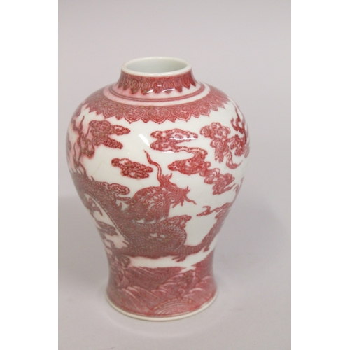 A CHINESE UNDERGLAZE RED AND WHITE PORCELAIN DRAGON VASE, with six ...