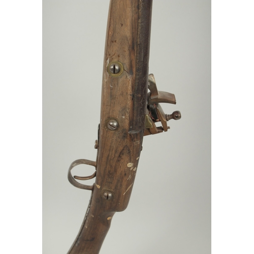 AN INDIAN FLINTLOCK RIFLE, 187cm long.
