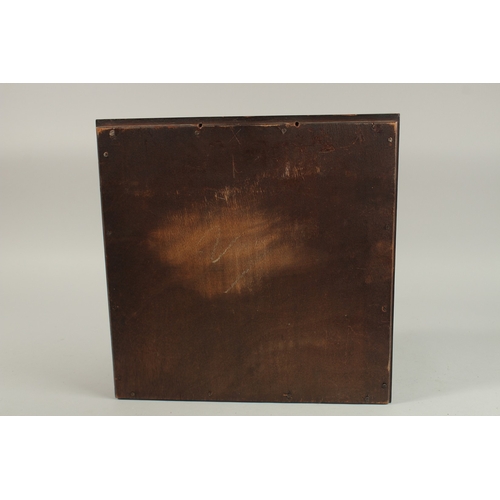 A 19TH CENTURY PERSIAN QAJAR GLAZED POTTERY TILE, the centre with ...