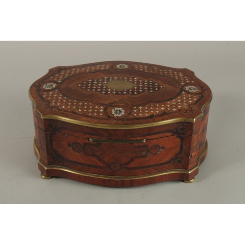A GOOD 19TH CENTURY BRASS AND MOTHER-OF-PEARL INLAID SHAPED OVAL SEWING ...
