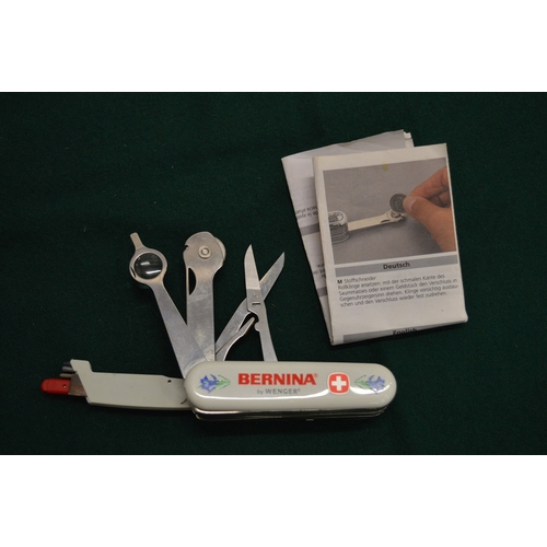 A Swiss Army style sewing knife.