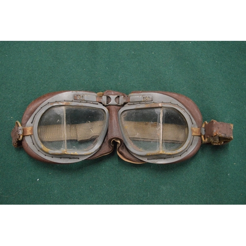 A pair of old motoring goggles.