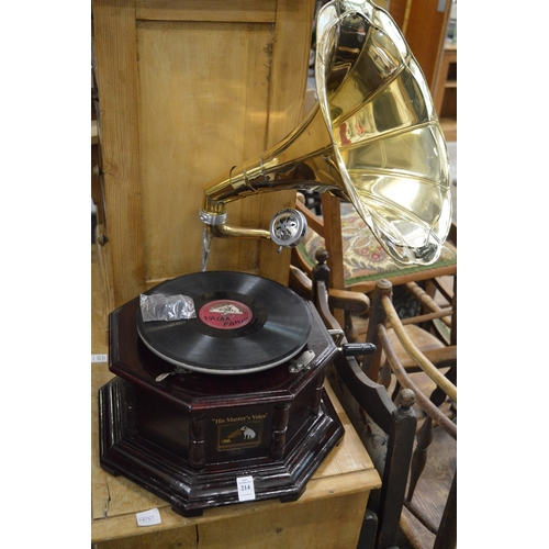 A reproduction HMV gramophone.