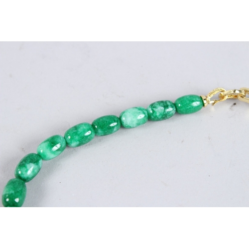 A GREEN BEAD CHAIN.