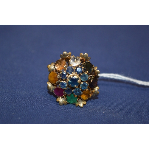 A 14ct gold multi colour gem set flower head ring.