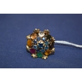A 14ct gold multi colour gem set flower head ring.