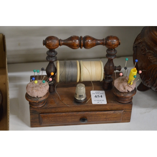 A small Victorian rosewood sewing compendium and a carved wood bowl and ...