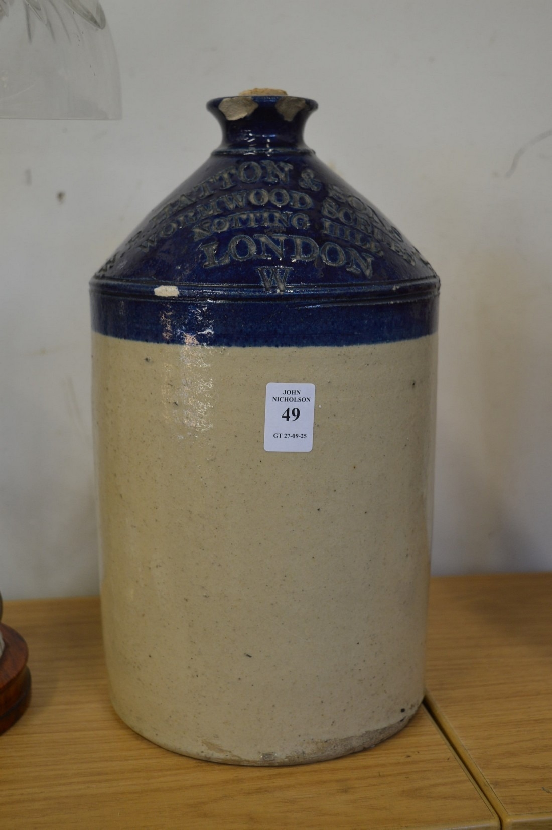 A stoneware bottle impressed with makers mark W R Hatton & Sons Ltd ...