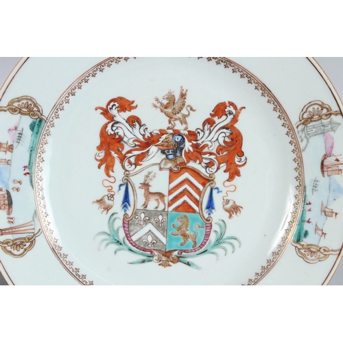 A SUPERB PAIR OF CHINESE EXPORT ARMORIAL PLATES. 9ins diameter. Circa 1740.