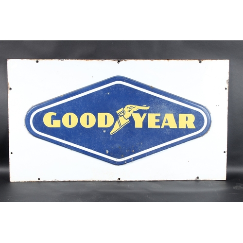 A LARGE VINTAGE GOODYEAR ENAMEL SIGN with the iconic Goodyear and ...