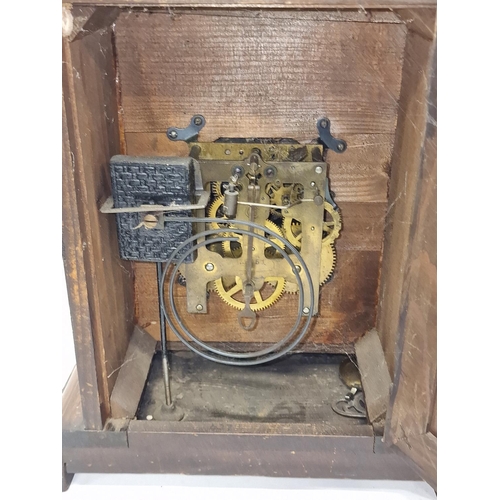 Two vintage wooden cased clocks.