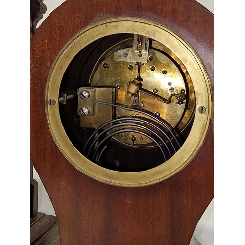 Two vintage wooden cased clocks.