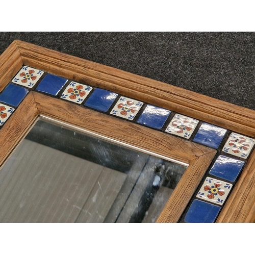 Vintage oak framed wall mirror with decorative blue and white tiled ...