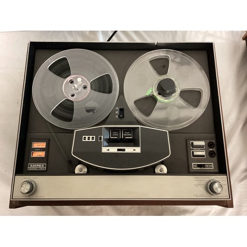 AMPEX STEREO REEL TO REEL TAPE RECORDER. Nice unit here complete with 2 ...