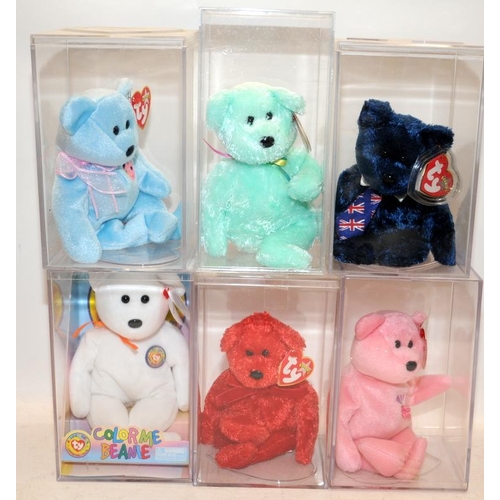 A collection of Beanie Babies, all presented in their perspex display ...