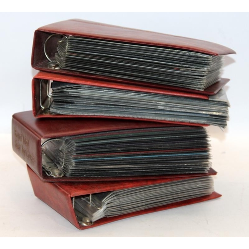 Four albums of GB stamps presentation packs including £10 stamp