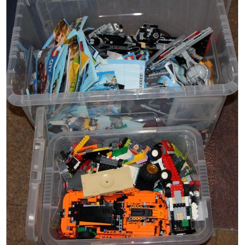 Very large quantity of Lego within two tubs, lots of part built models ...