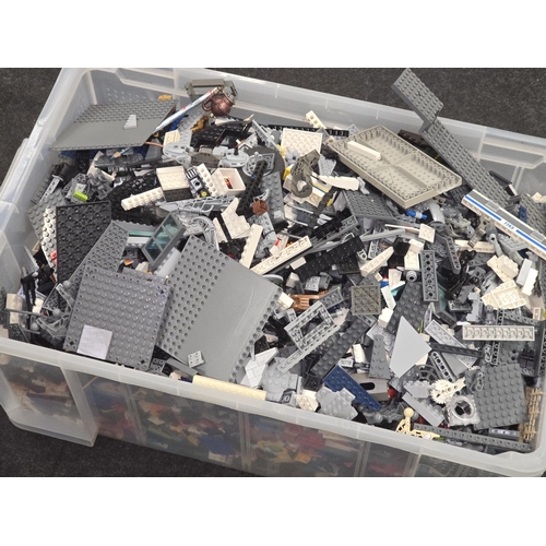 Plastic tub containing a very large collection of Lego to include some ...