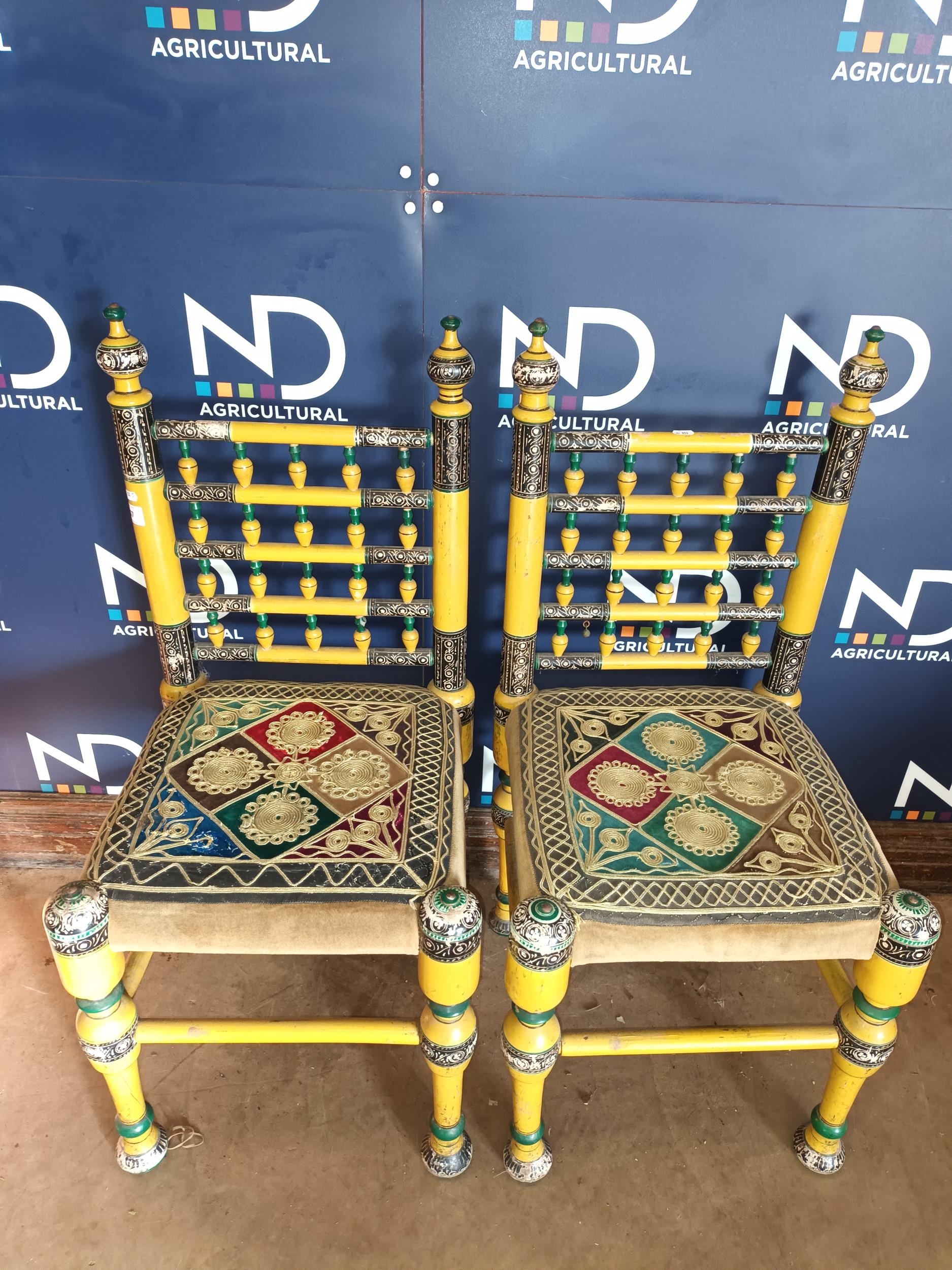 PAIR OF INDIAN TEMPLE CHAIRS