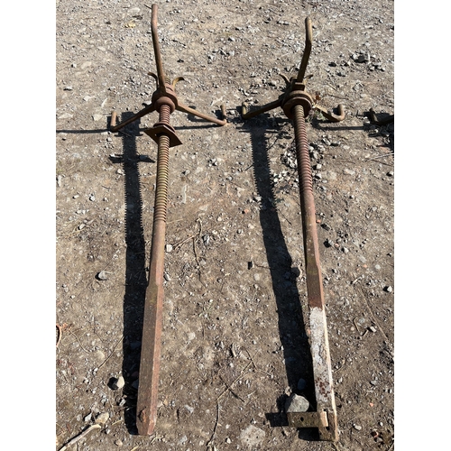 FOUR CAST IRON JACKS