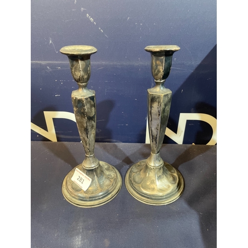 PAIR OF WHITE METAL CANDLESTICKS