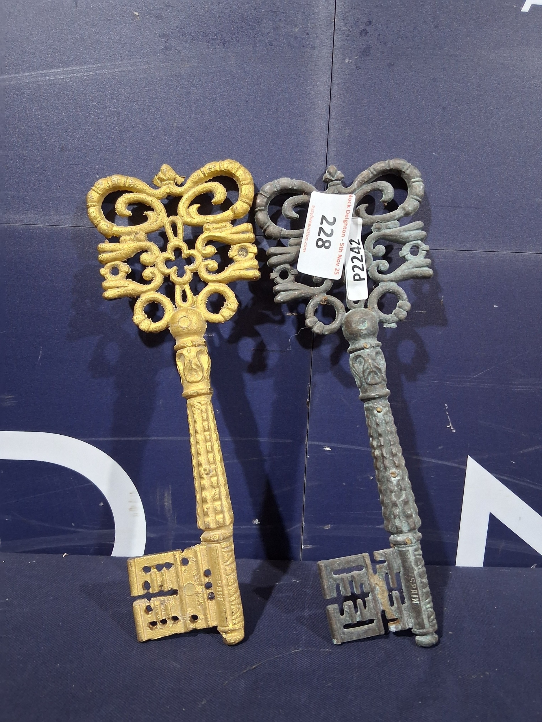TWO LARGE CAST IRON KEYS