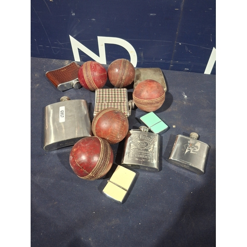 HIP FLASKS AND CRICKET BALLS