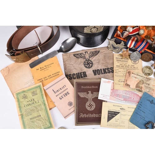 An assembled group of militaria including a German Eastern Front medal ...