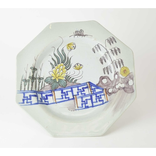 An octagonal Bristol delft plate, circa 1760-70, finely painted in blue ...