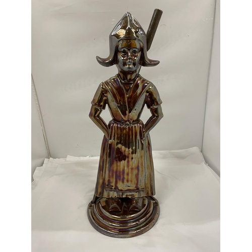 AN ART DECO STYLE LUSTRE DUTCH GIRL COMPANION SET HEIGHT 50CM