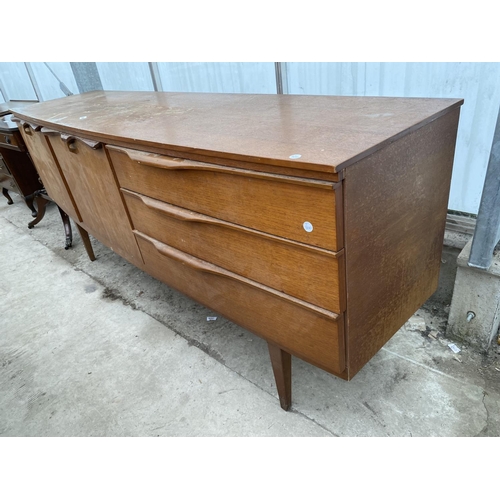A RETRO TEAK 'BEAUTILITY' SIDEBOARD WITH THREE DRAWERS AND TWO ...