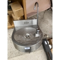 A STAINLESS STEEL ACORN THORN HAND WASHING SINK