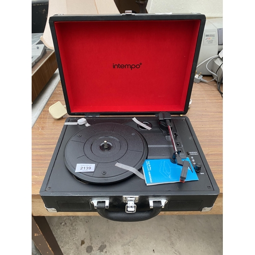 AN INTEMPO RECORD DECK IN CARRY CASE