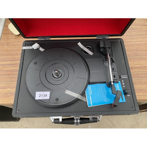 AN INTEMPO RECORD DECK IN CARRY CASE