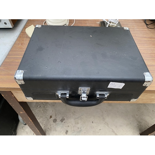 AN INTEMPO RECORD DECK IN CARRY CASE