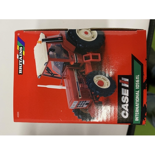 A BRITAINS MODEL OF AN INTERNATIONAL 1056XL TRACTOR REF NO 43329 SCALE 1:32