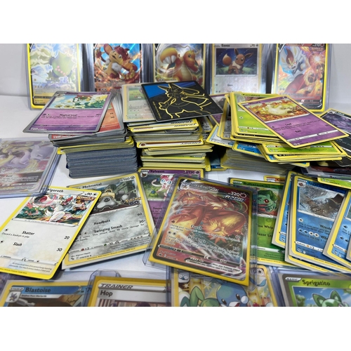 A LARGE COLLECTION OF APPROXIMATELY 500 POKEMON CARDS, V CARDS, HOLOS ETC
