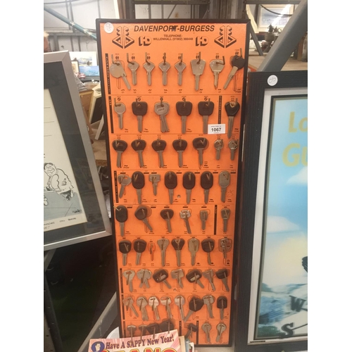 A VINTAGE DAVENPORT BURGESS GARAGE CAR KEY BOARD WITH KEYS